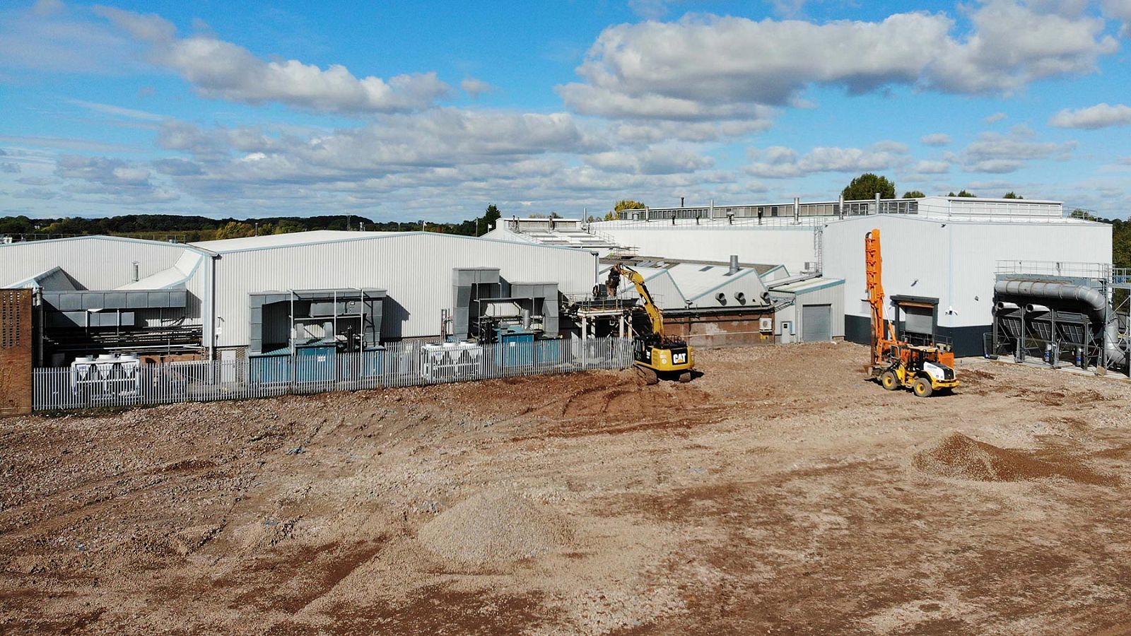 Factory extension with new offices and HGV access.