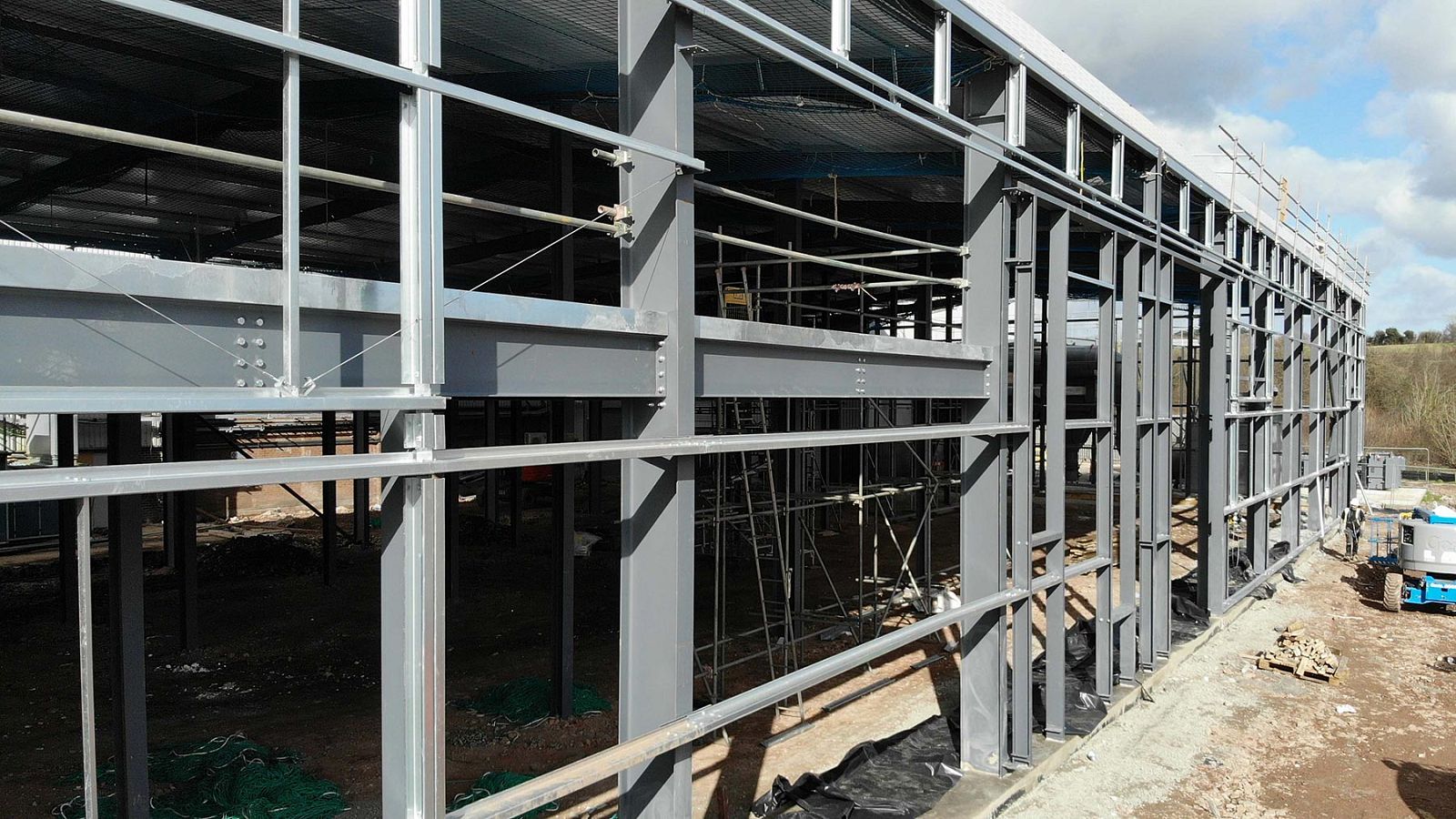 Factory extension with new offices and HGV access.